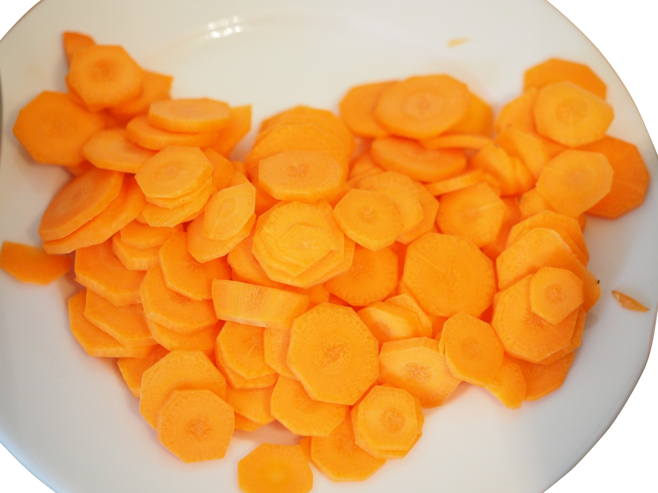 Orange Chopped Carrots in a plate PNG Image - PurePNG | Free ...